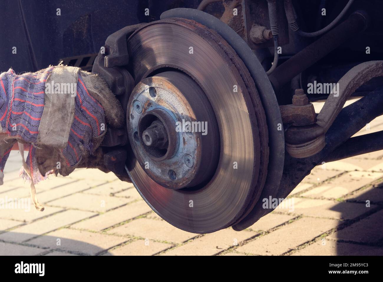 Car repair and service concept. Wheel balancing or repair and change ...