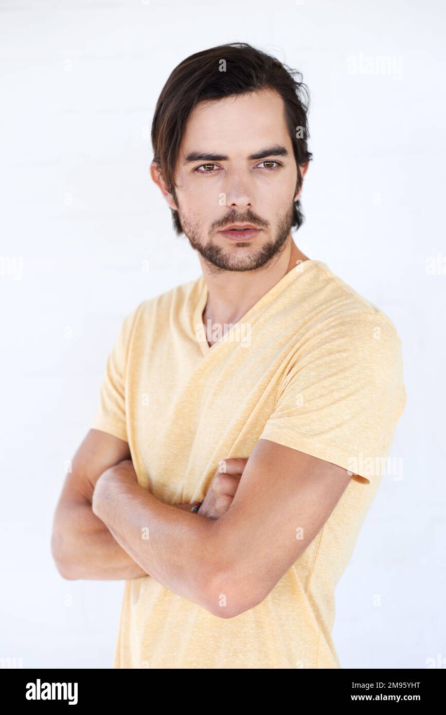 Man, vertical and thinking with casual fashion and arms crossed with ...