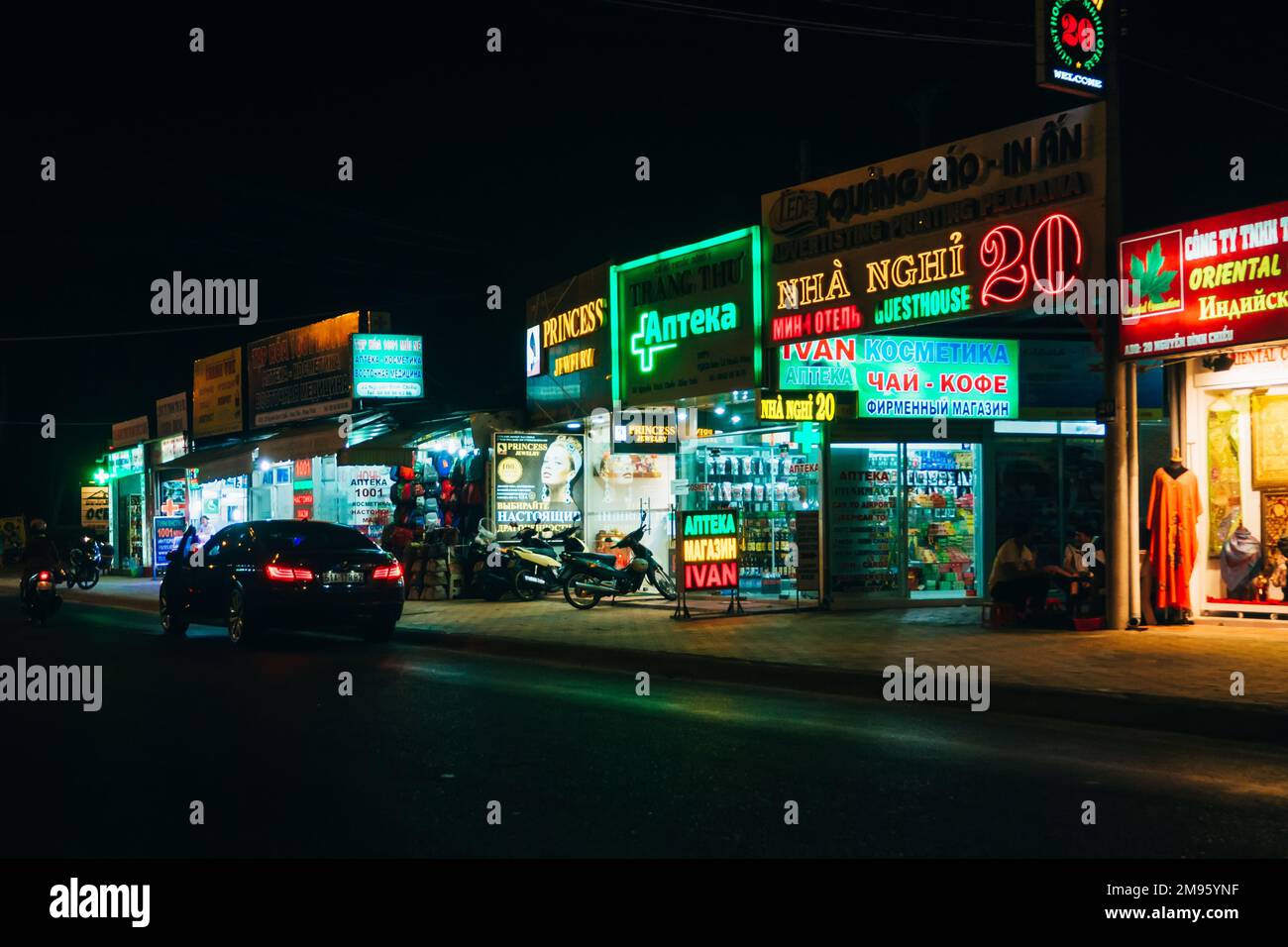 MUI NE, VIETNAM - CIRCA MARCH 2017: Traffic on the street at night on ...