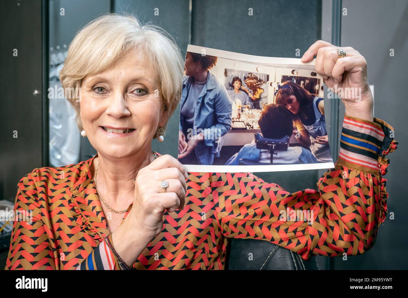 Former presenter Debbie Rix holds a photo of her in makeup on her first ...