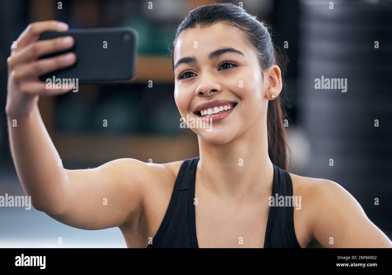 A Good Sweat Gets Me Smiling A Fit Young Woman Taking Selfies At The