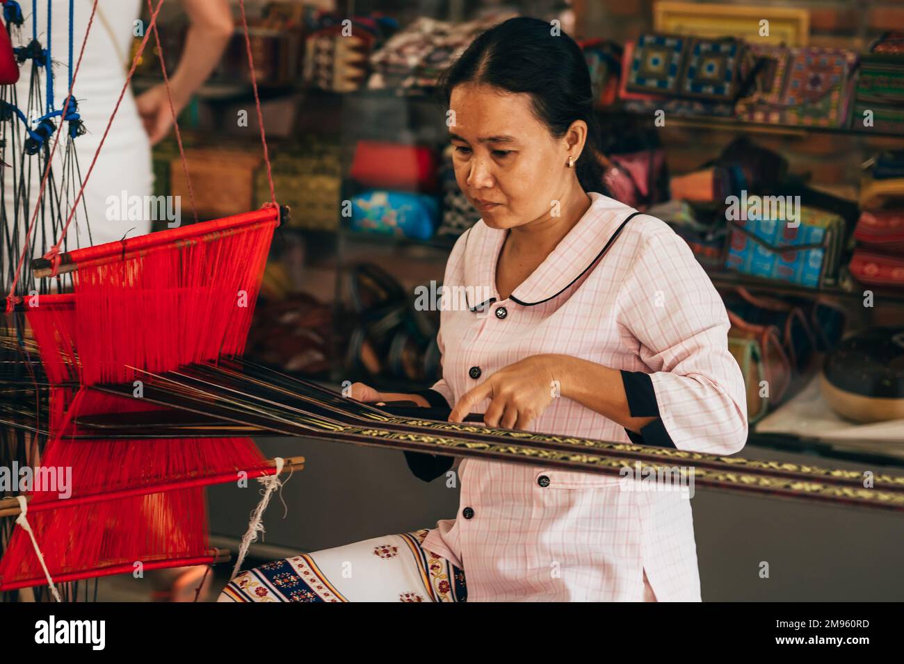 Vietnamese woman sewing hi-res stock photography and images - Alamy