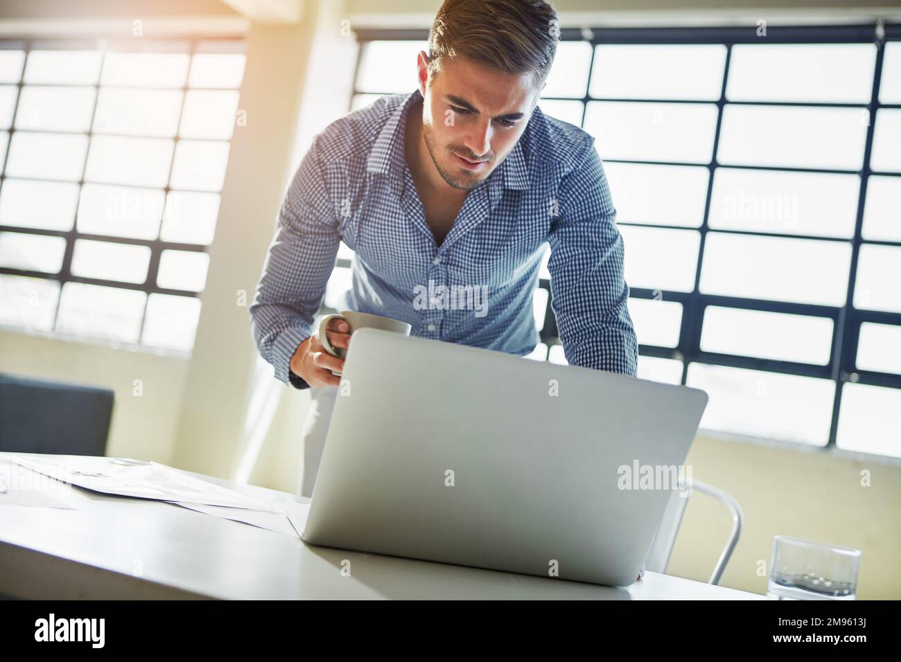 Business man, laptop and information technology with system upgrade ...