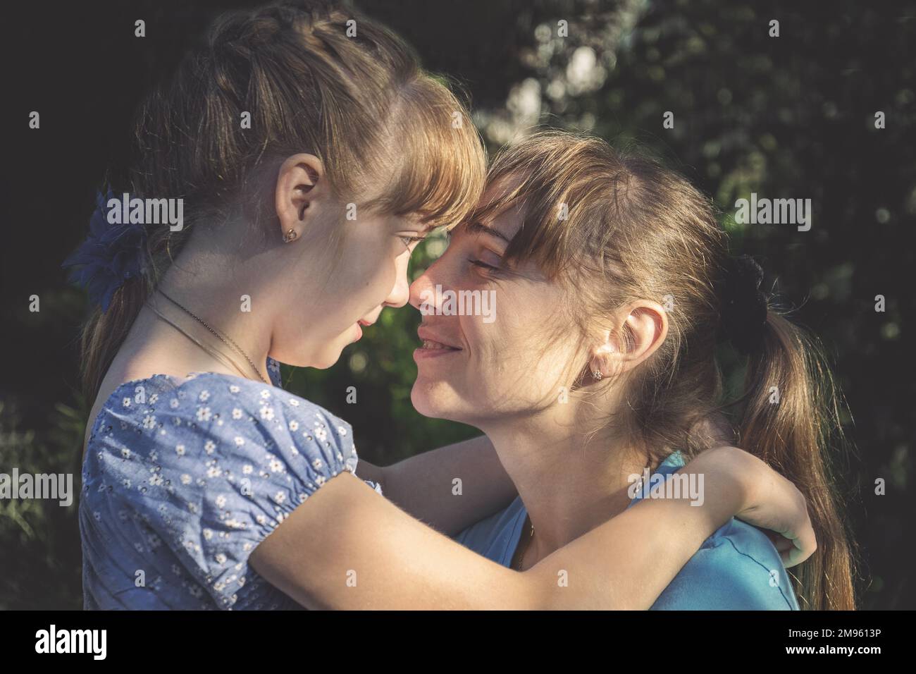 Mother-daughter relationship. Love, mutual understanding between parents and children Stock ...