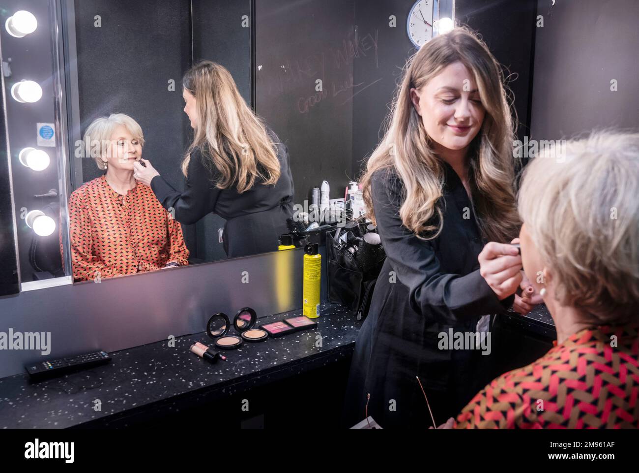 Former presenter Debbie Rix (right) in makeup before going on air as ...