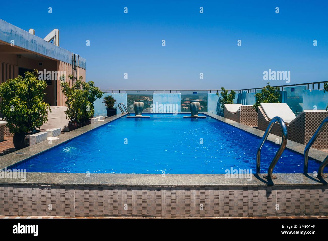 Pool on the roof of a hotel hi-res stock photography and images - Alamy