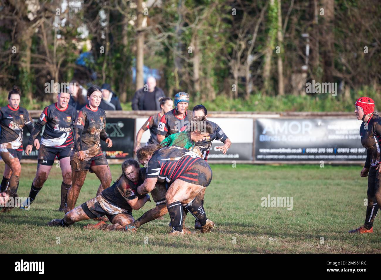 Camborne RFC playing Withycombe RFC on a very muddy pitch in January ...