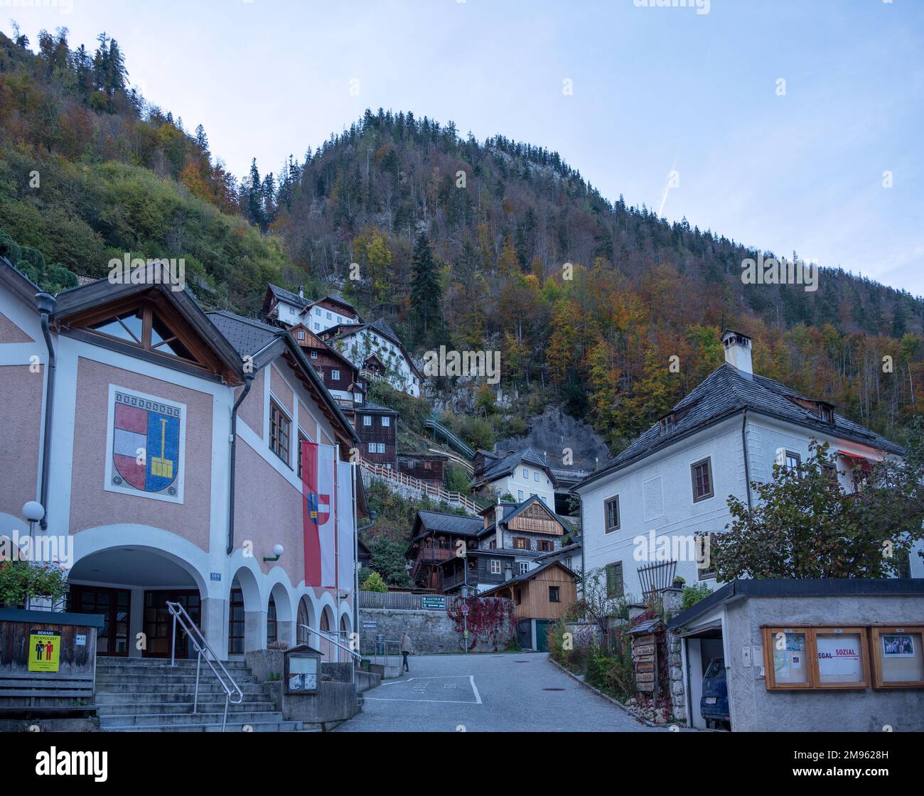 View of a wooden chalet alpine house situated at the salt mine village ...