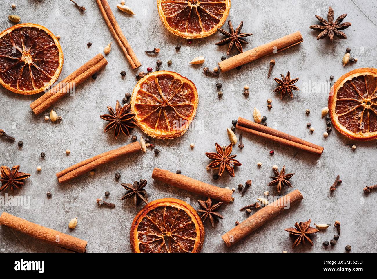 Dried orange, cinnamon sticks, anise star, cardamom. Traditional mulled ...