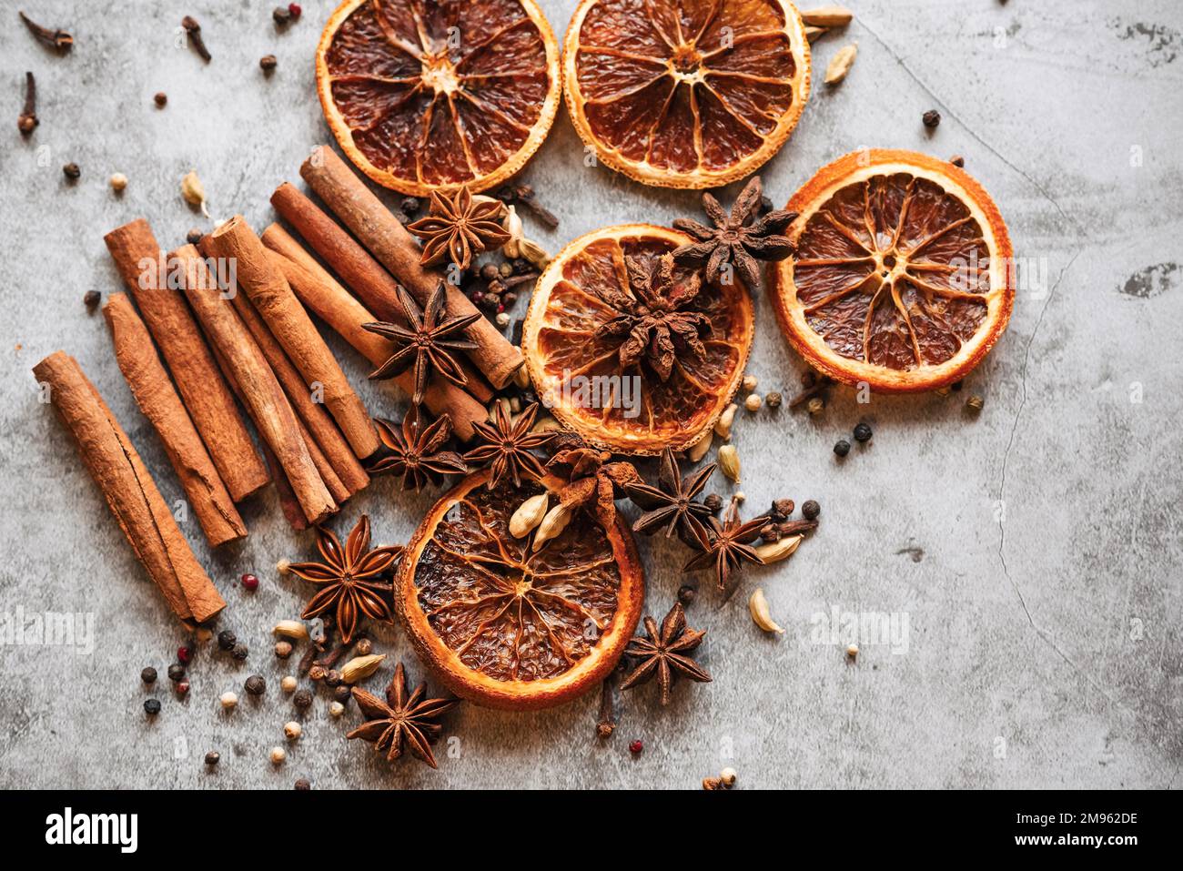 Dried orange, cinnamon sticks, anise star, cardamom. Traditional mulled ...