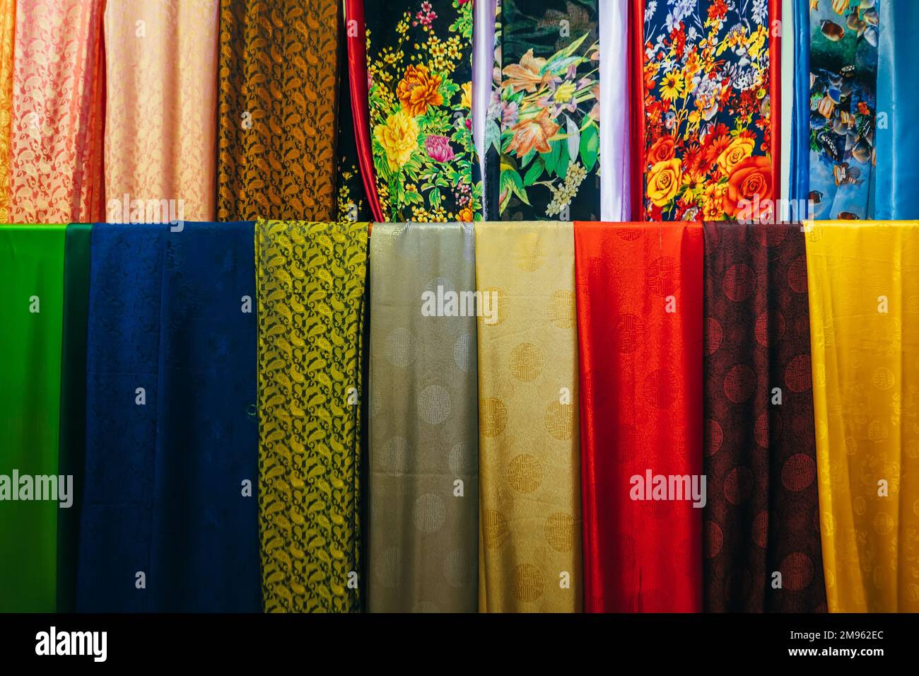DA LAT, VIETNAM - MARCH 9, 2017: Silk scarfs at a silk factory XQ in Da ...