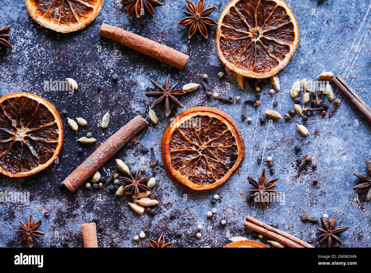 Dried orange, cinnamon sticks, pink pepper, cardamom, anise, cloves ...