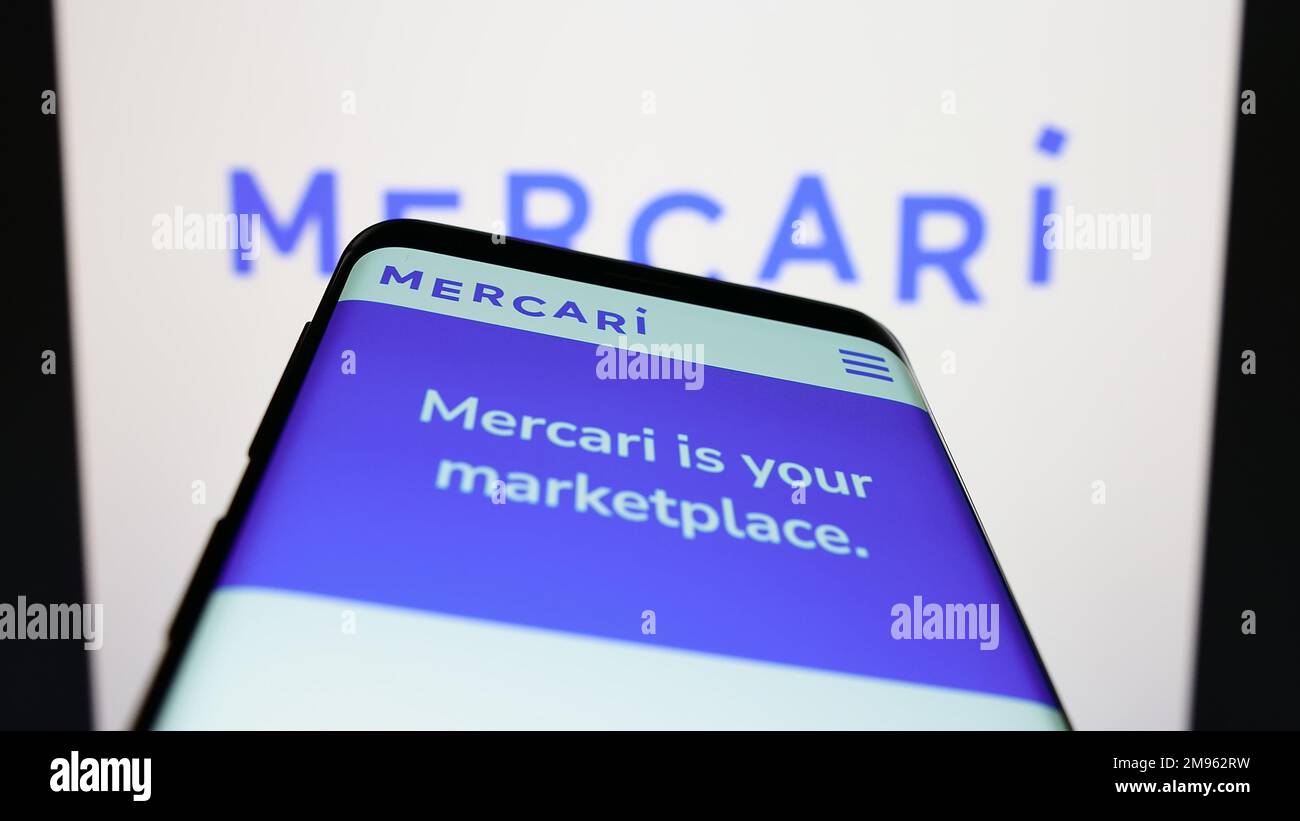 Smartphone with website of Japanese e-commerce company Mercari Inc. on ...