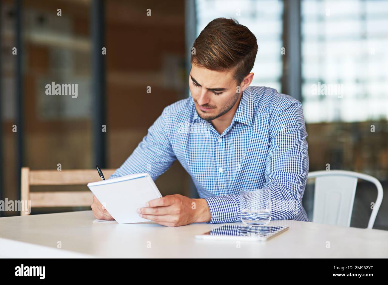 Notebook, planning and business man writing schedule, brainstorming ...