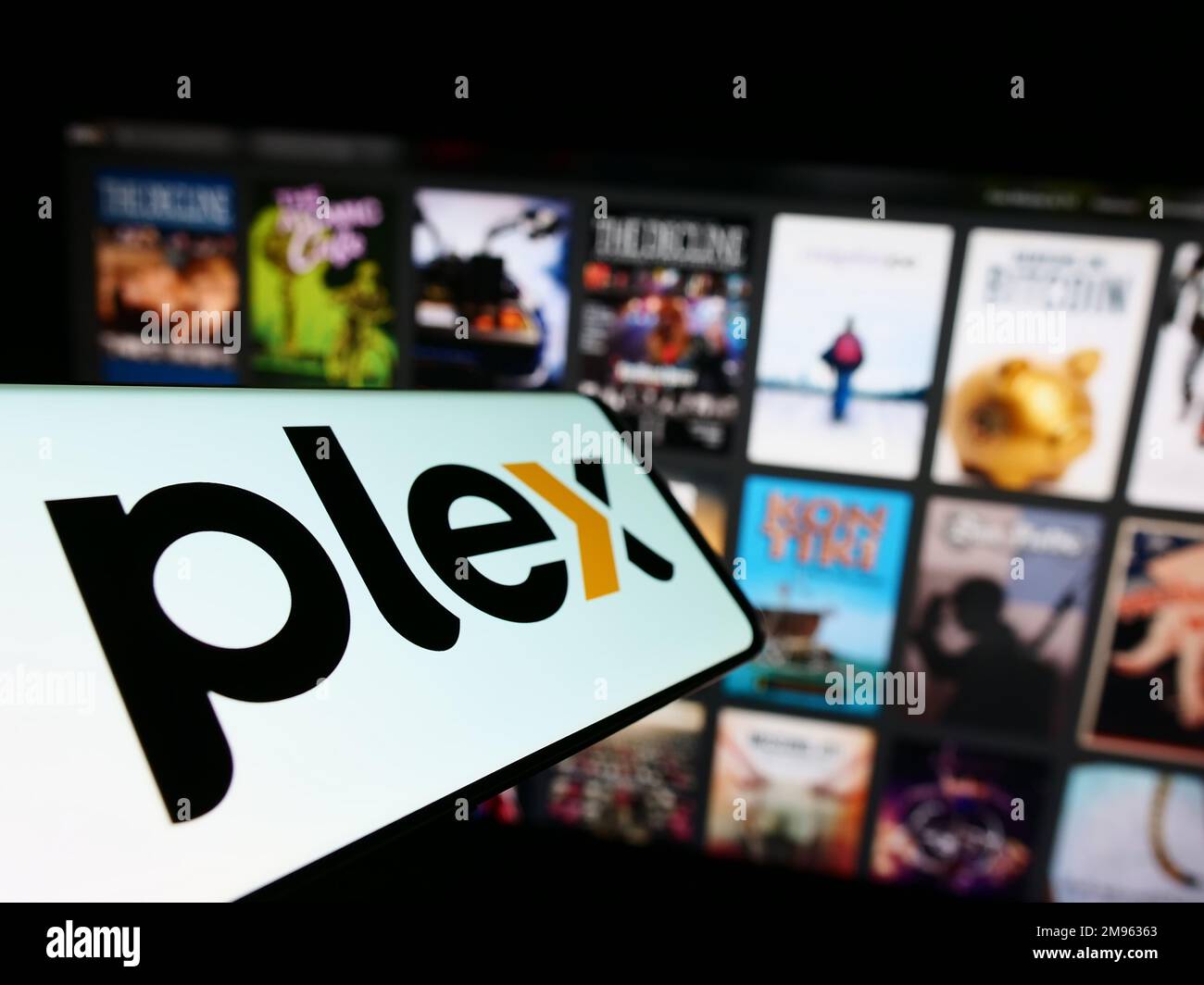 Mobile phone with logo of American video streaming company Plex Inc. on ...