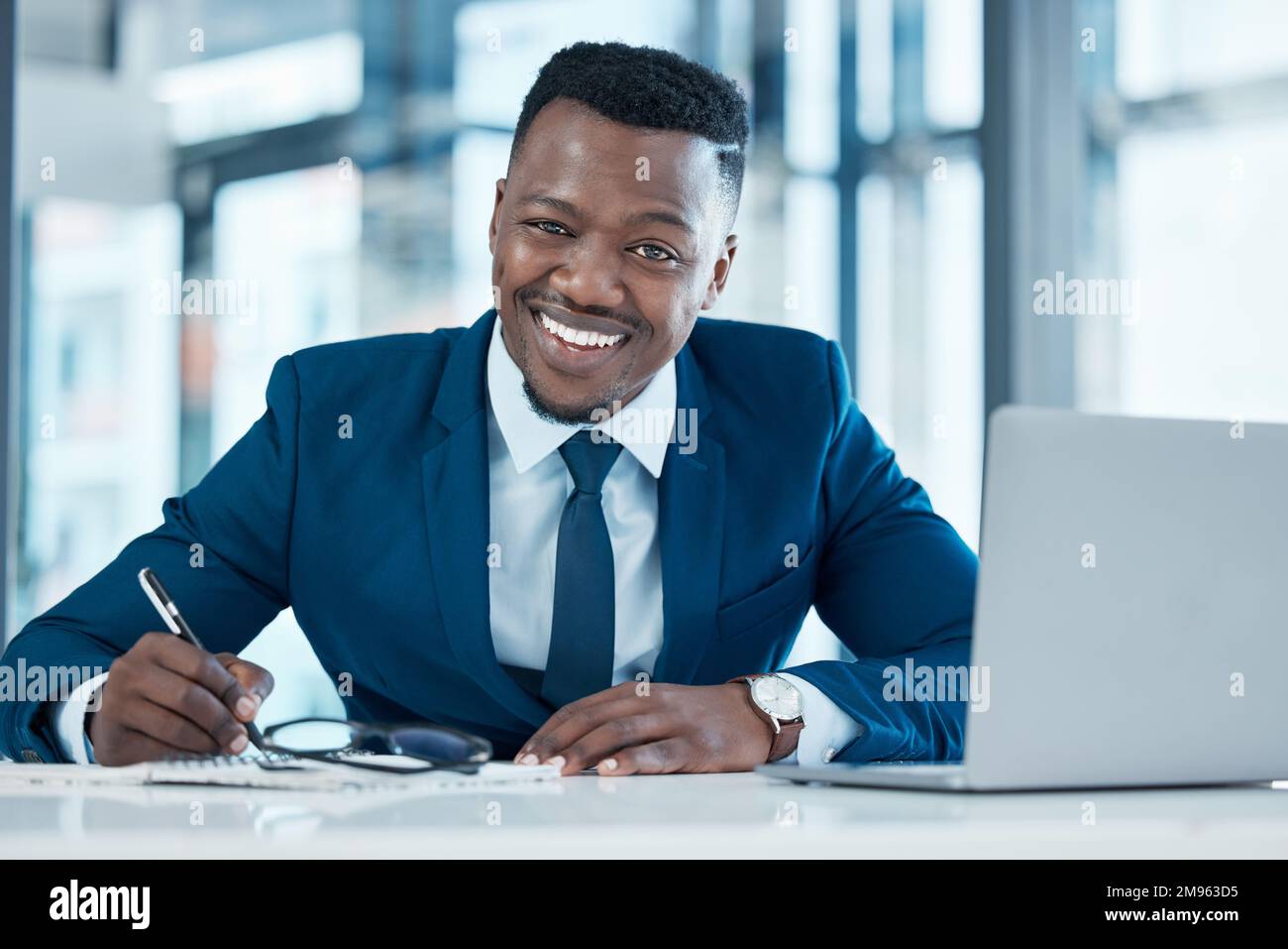 Write your own paycheck with passion. Portrait of a confident young ...