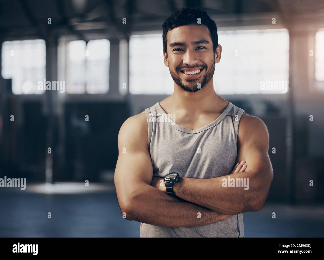 Workout to impress yourself first. Portrait of a muscular young man ...