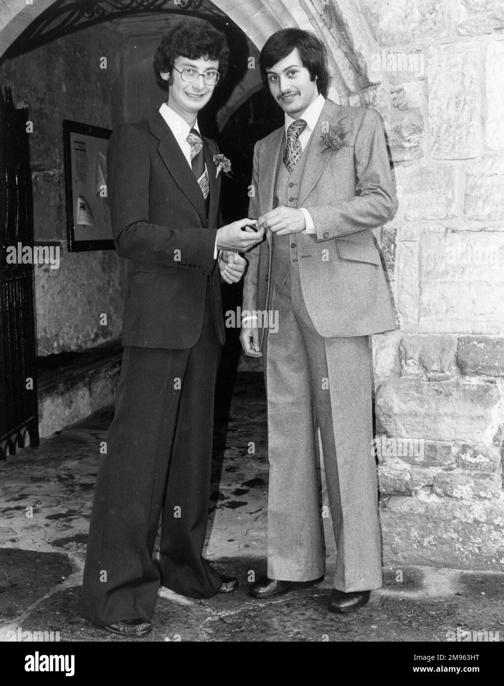 The best man (left) and the rather nervous-looking groom arrive at the ...