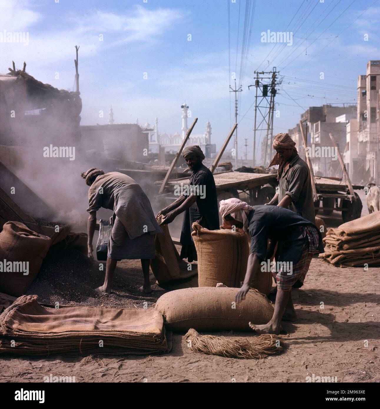 Men at work in one of the main streets at Sukkur, West Pakistan Stock ...