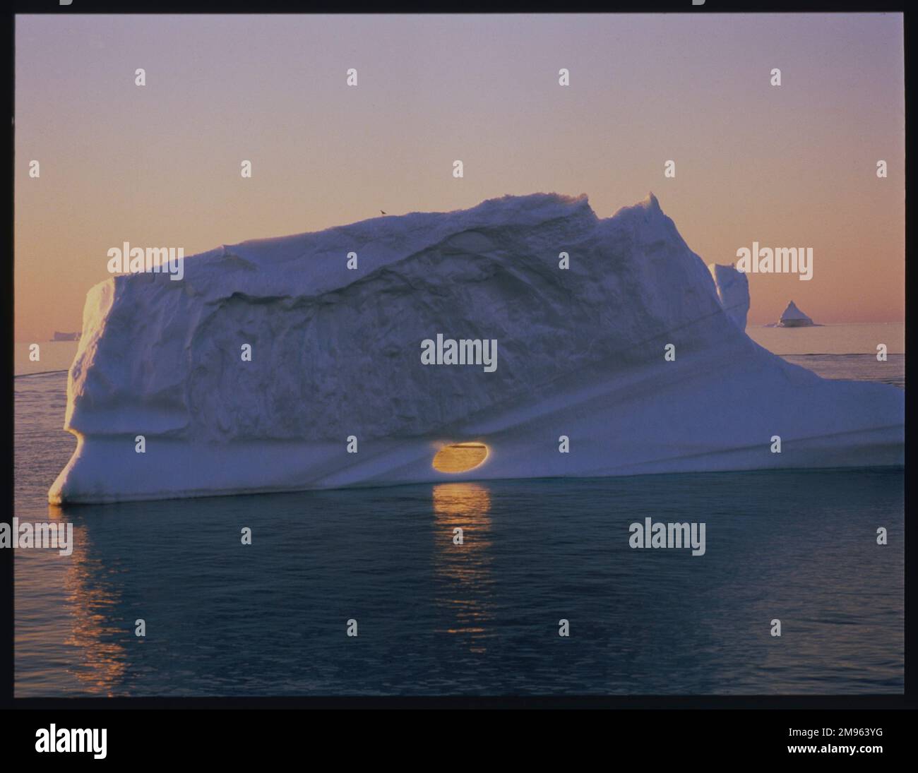 Icebergs in the mignight sun near Aasiaat (Egedesminde), Greenland ...