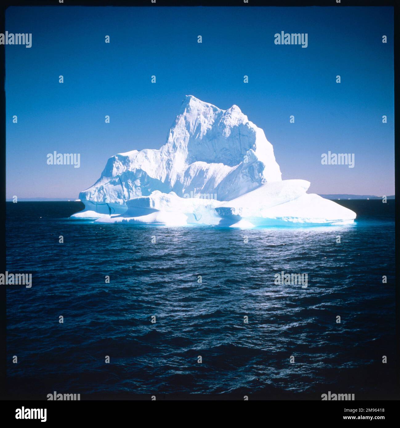 A floating iceberg in Disko Bay at Qeqertarsuaq (Godhavn), Greenland ...
