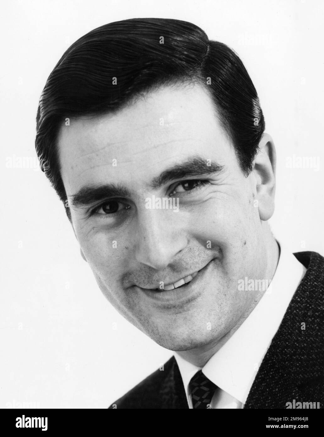 Head and shoulders portrait of a man posing for the camera Stock Photo ...