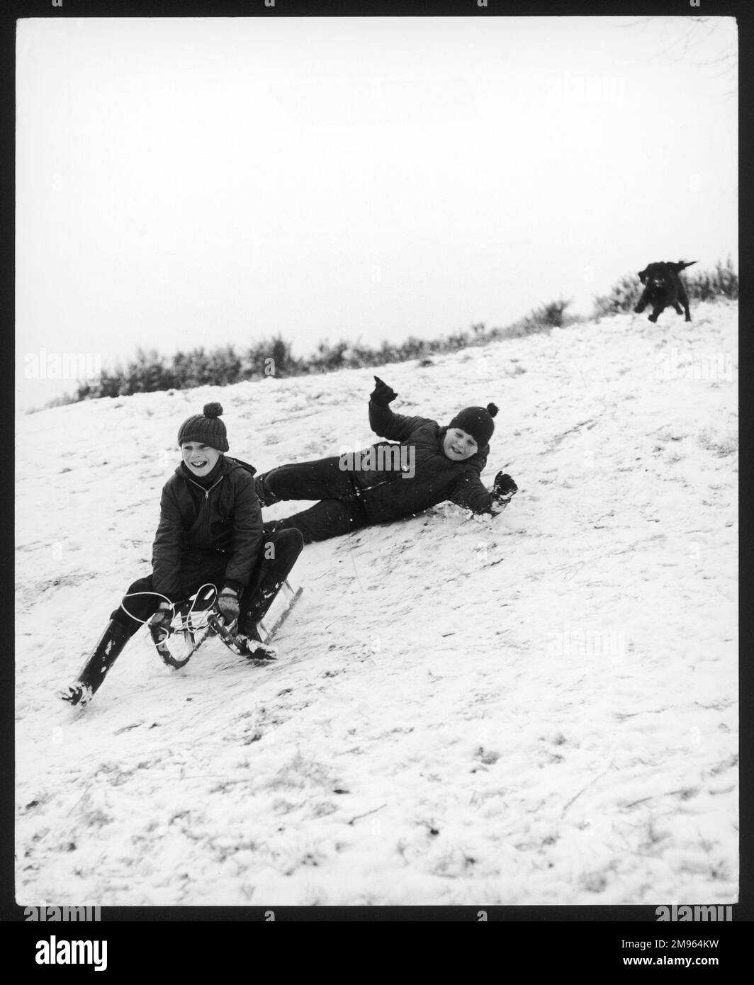 Children in snow 1960s hi-res stock photography and images - Alamy