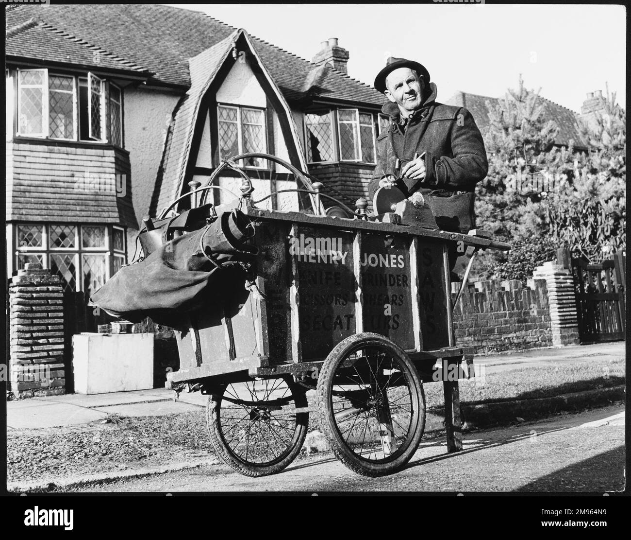 Henry Jones, mobile grinder with his grindstone on a trolley, Horley ...