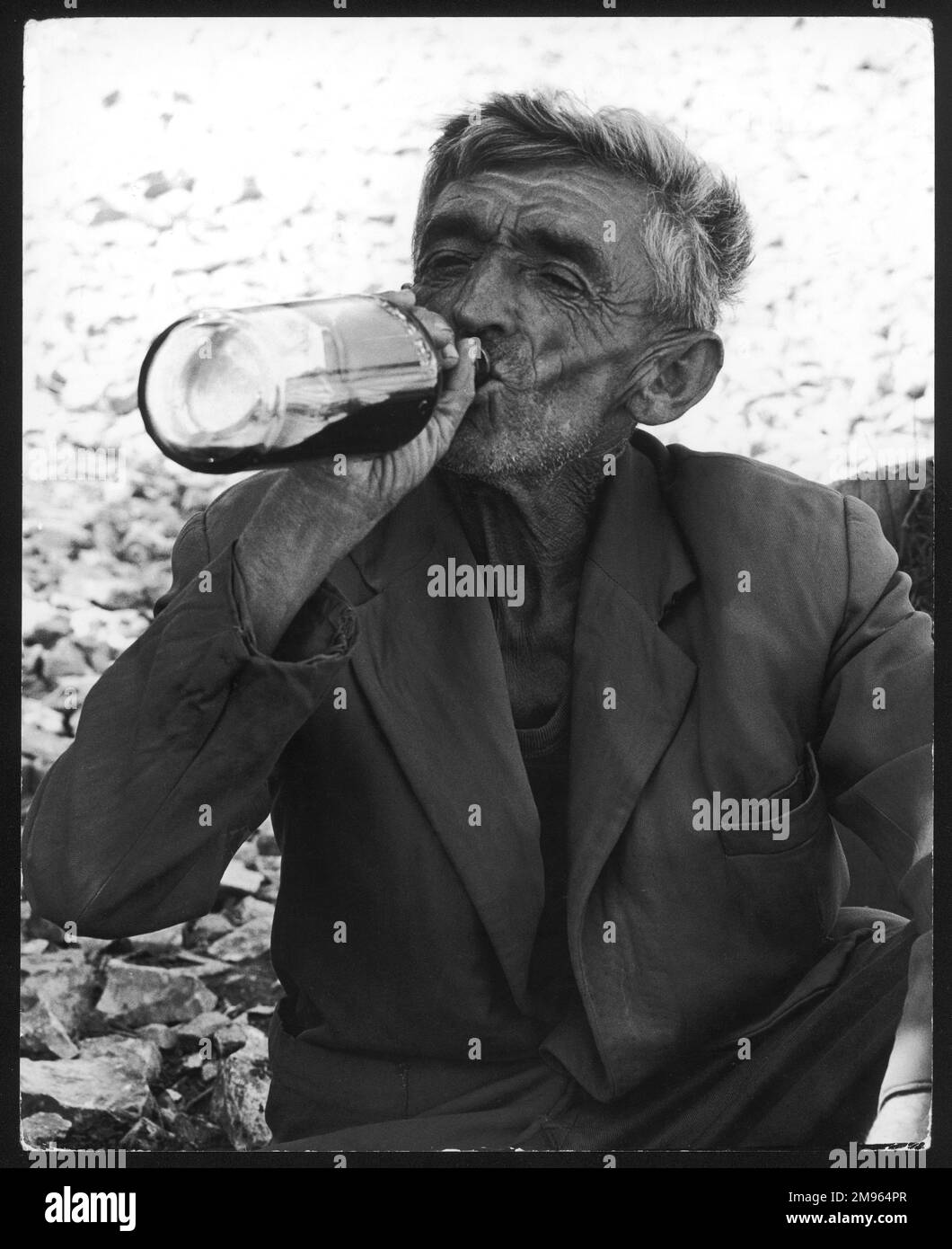 Swigging hi-res stock photography and images - Alamy