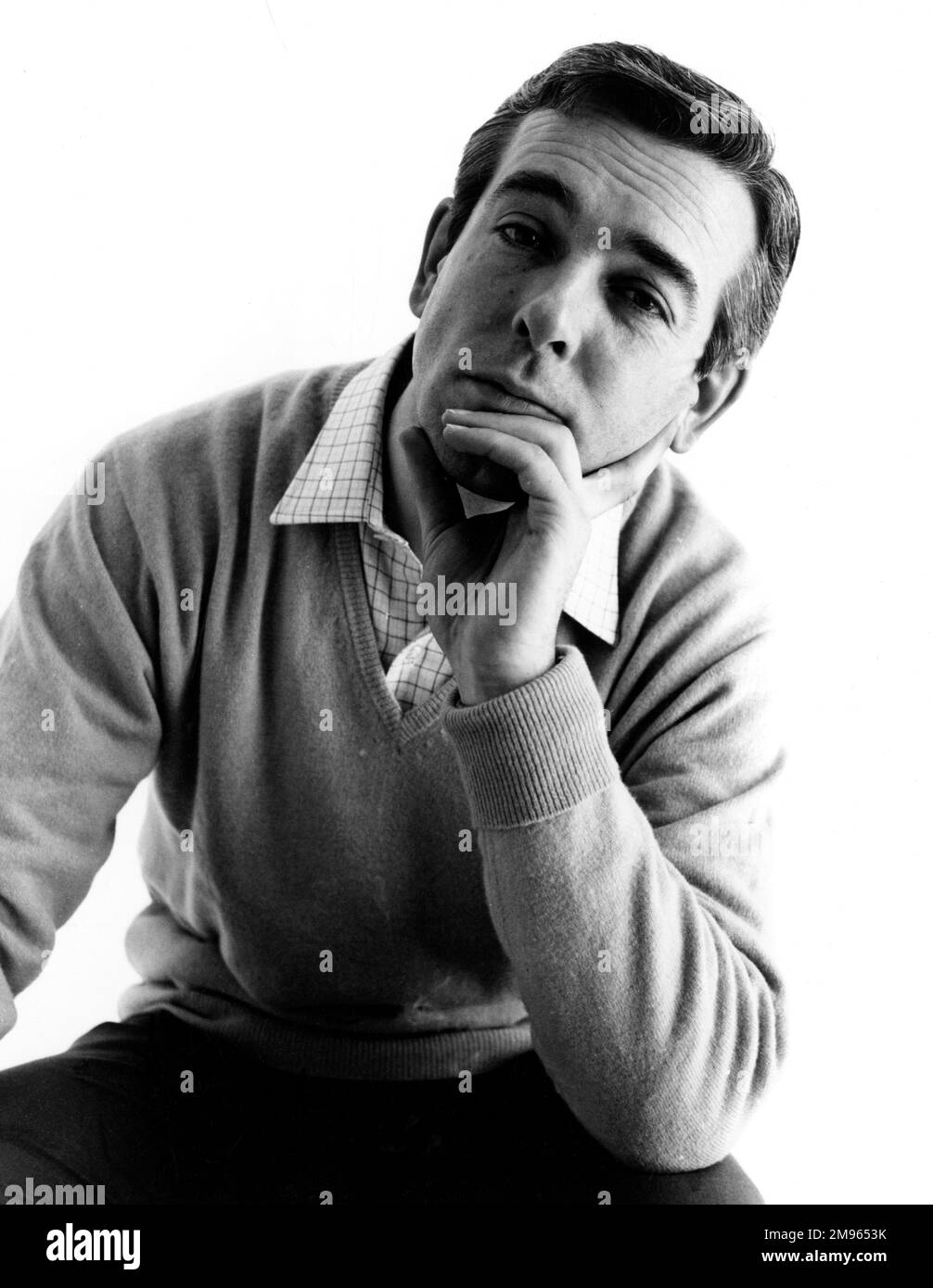 On a stool Black and White Stock Photos & Images - Alamy