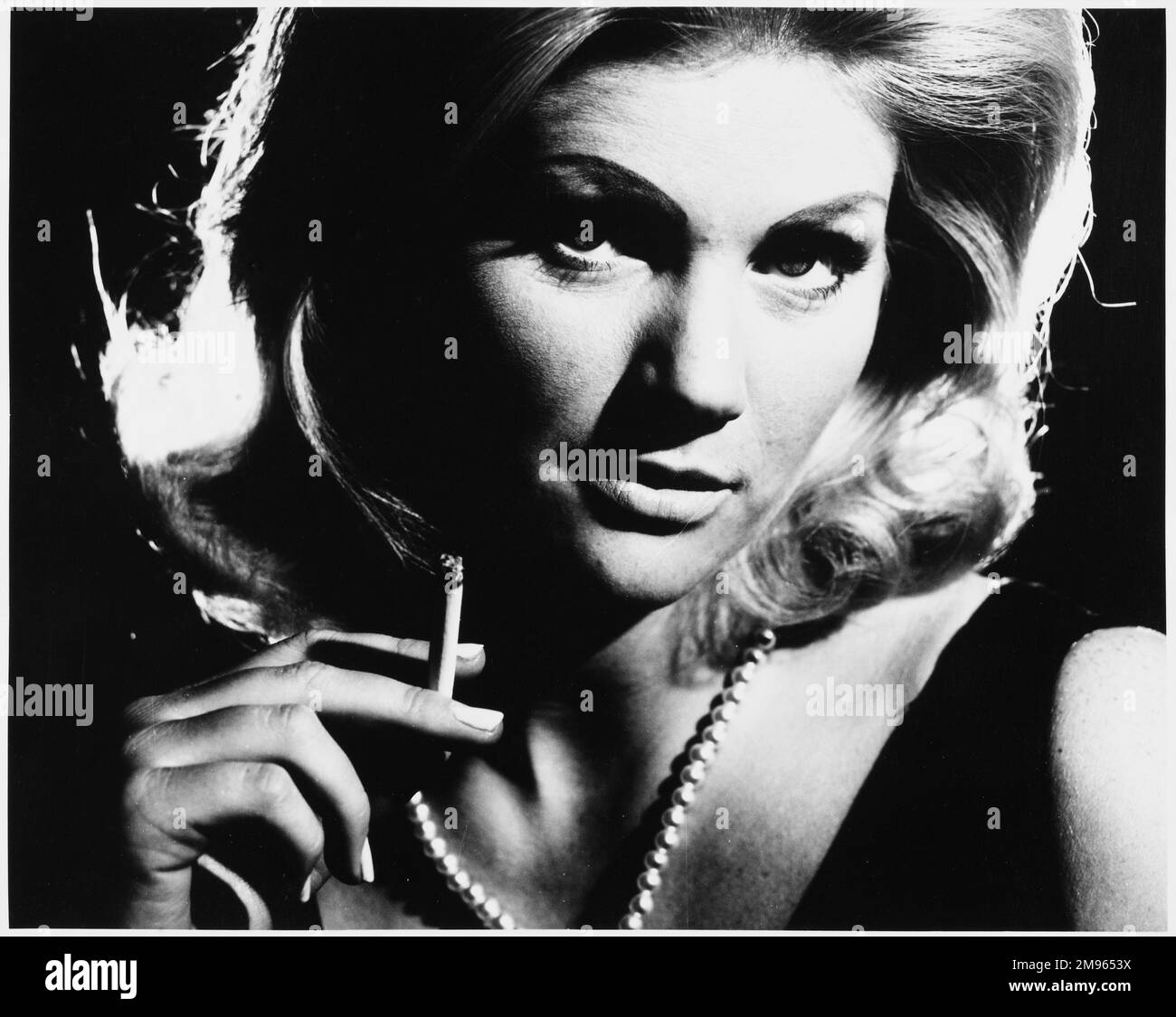 Cigarette ad woman hi-res stock photography and images - Alamy