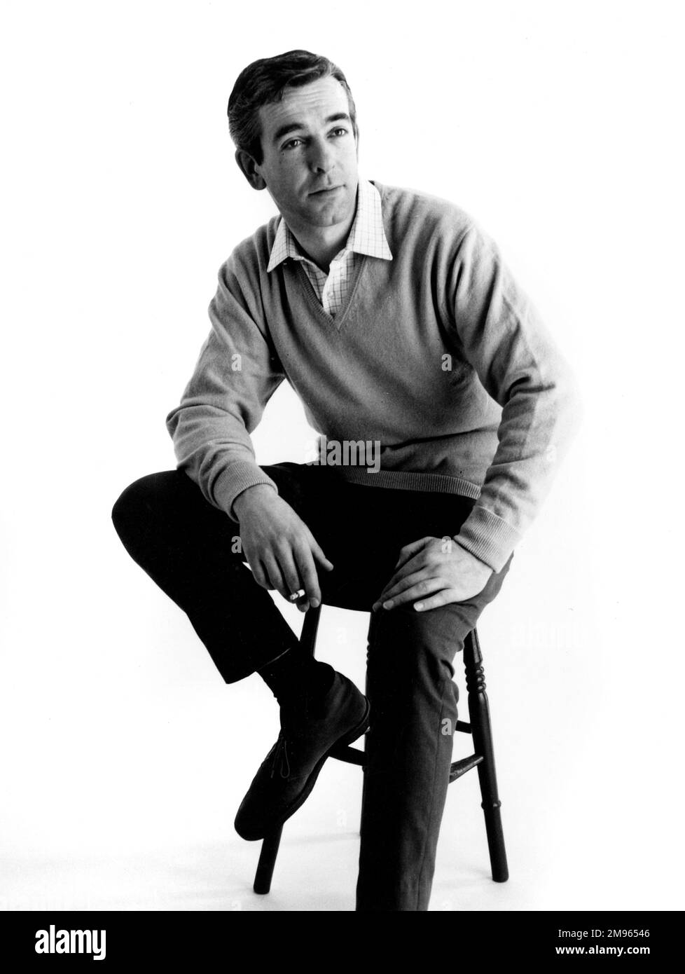 On a stool Black and White Stock Photos & Images - Alamy