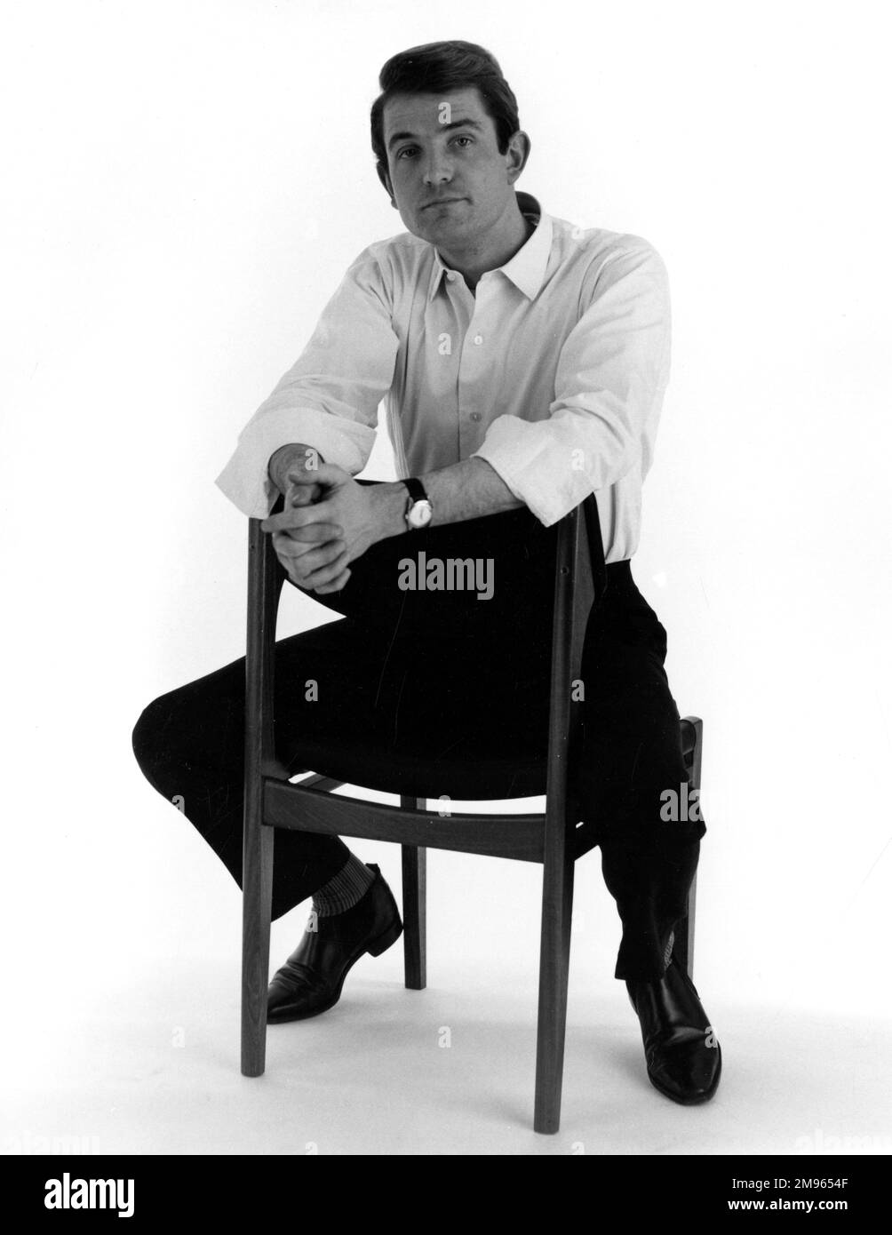 Chair sits Black and White Stock Photos & Images - Alamy