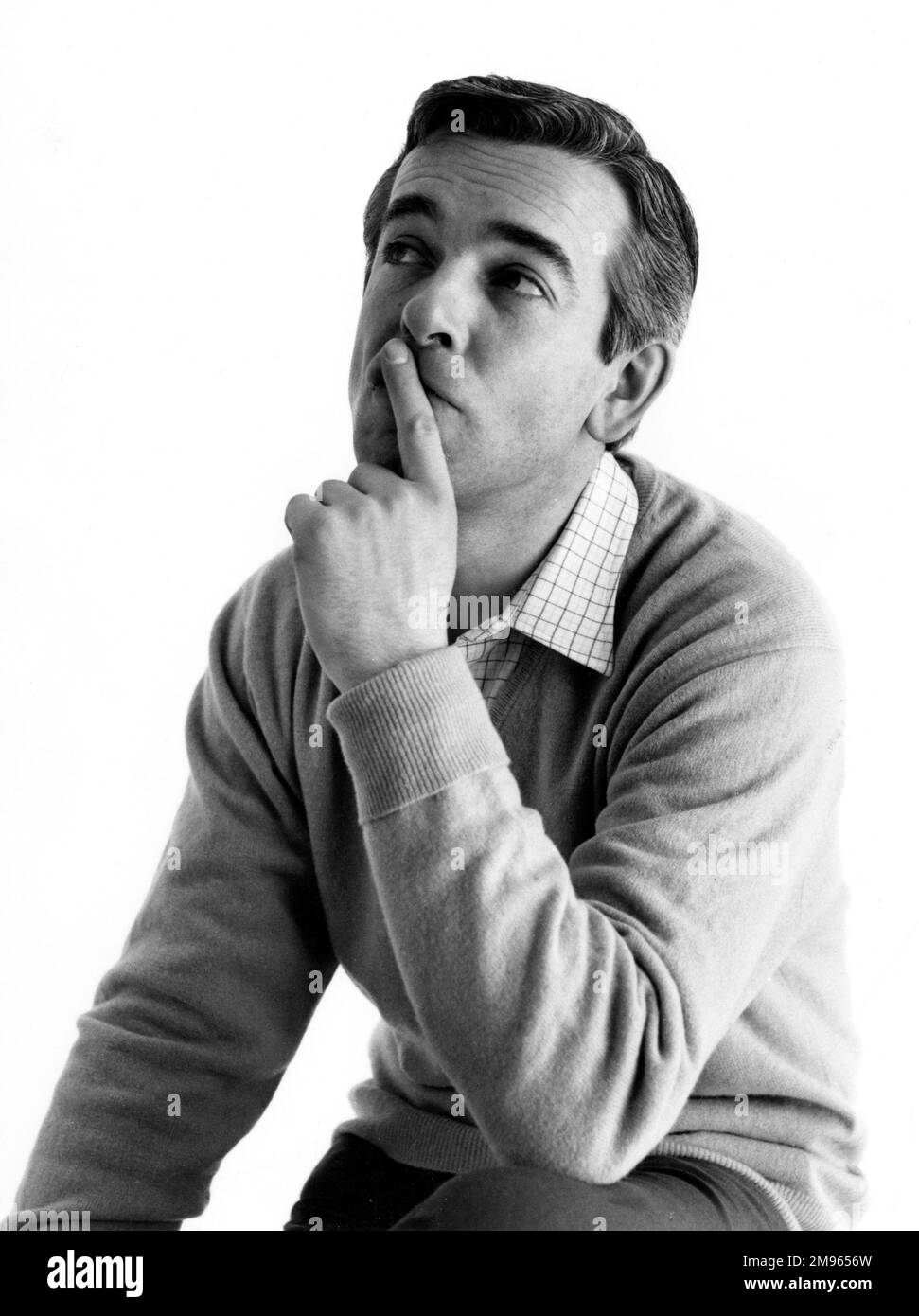 On a stool Black and White Stock Photos & Images - Alamy