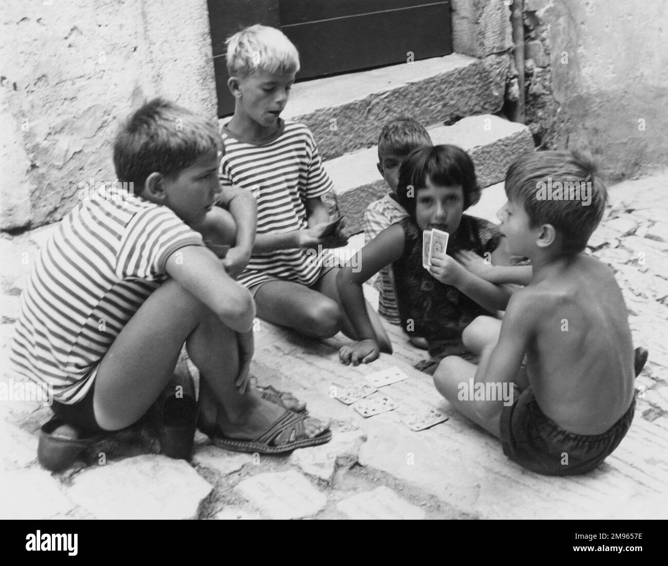 Group playing cards in Black and White Stock Photos & Images - Alamy