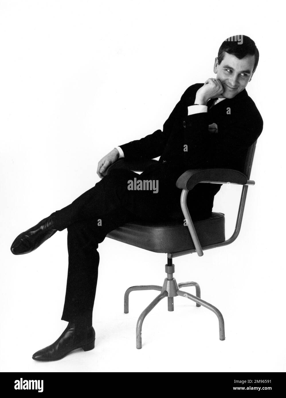 Poses on chair hi-res stock photography and images - Alamy