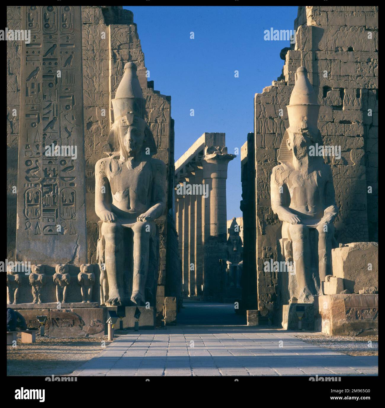 Giant, seated statues of RAMESES II ('The Great'), in front of the ...