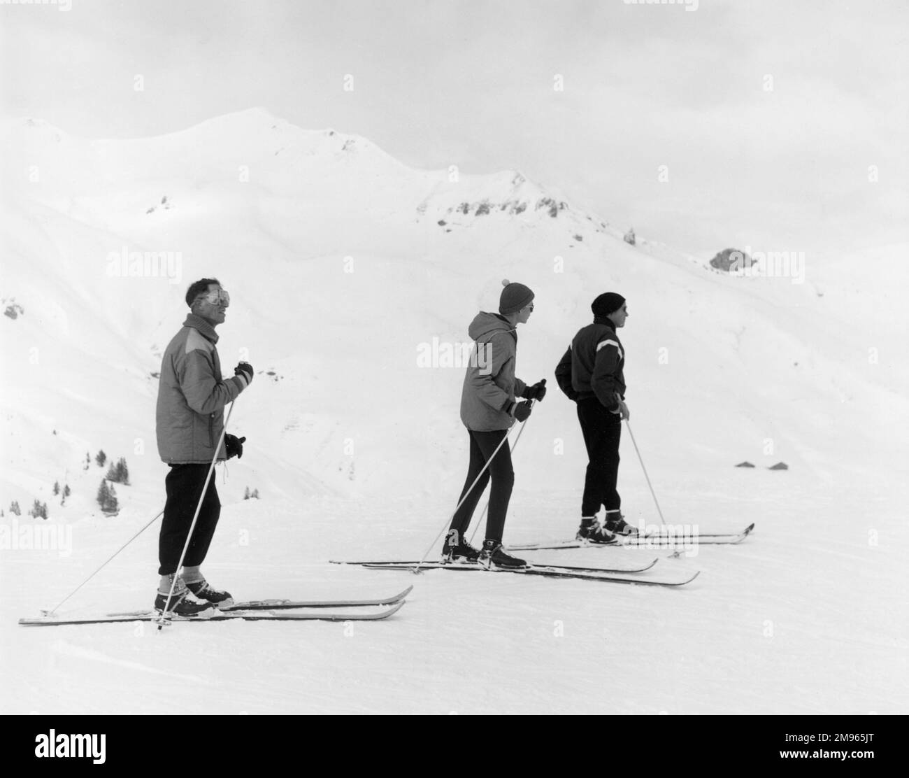 Skiers skiing Black and White Stock Photos & Images - Alamy
