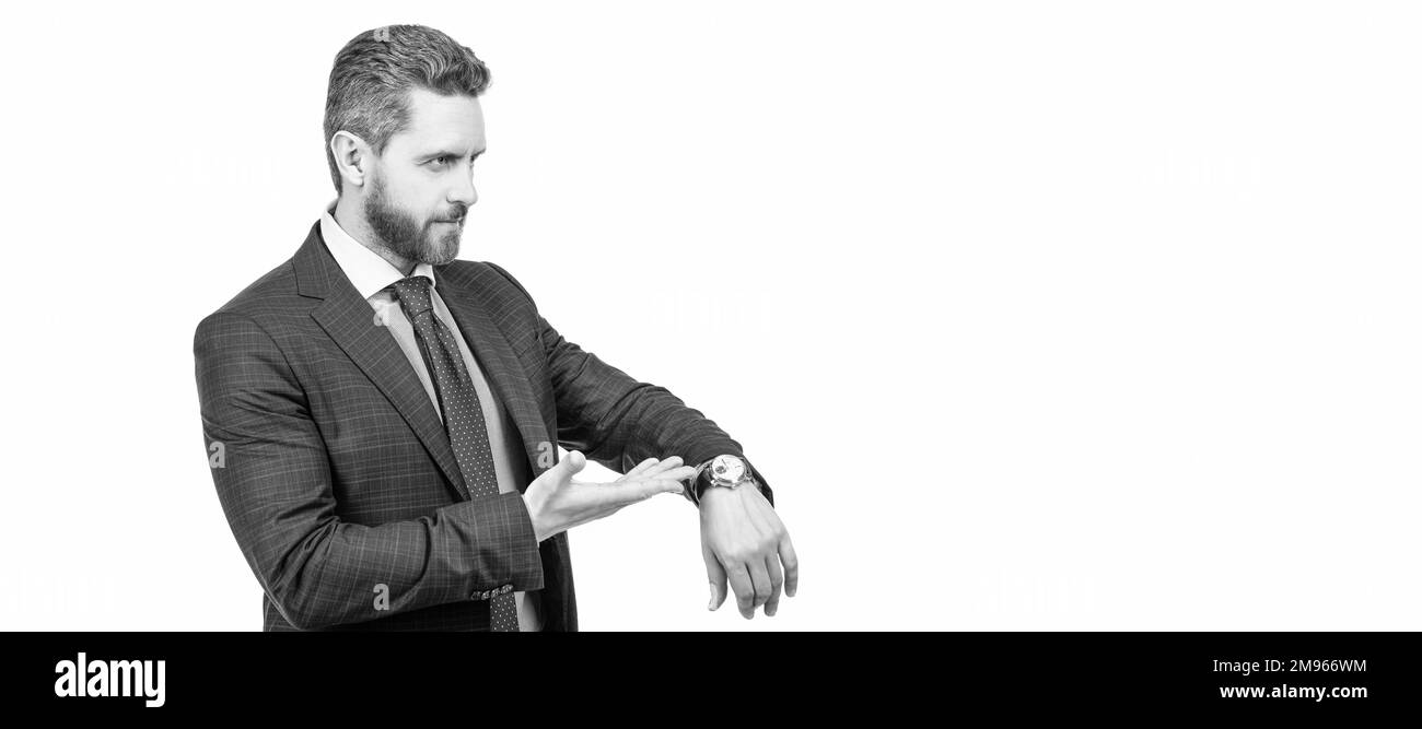 Watch is a new style. Senior manager point finger at wrist watch. Time ...