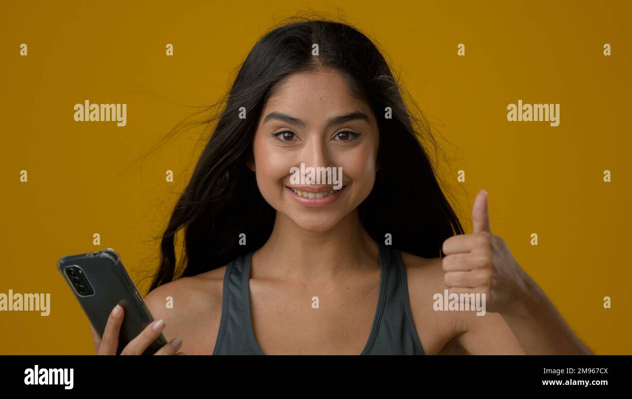 Portrait Indian ethnic girl woman female lady with mobile phone win ...