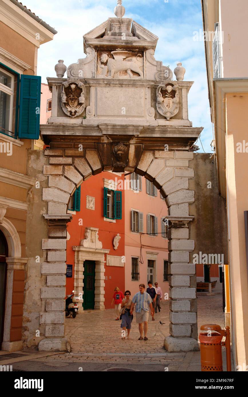 The old town gate at the entrance to Rovinj, on the western coast of ...