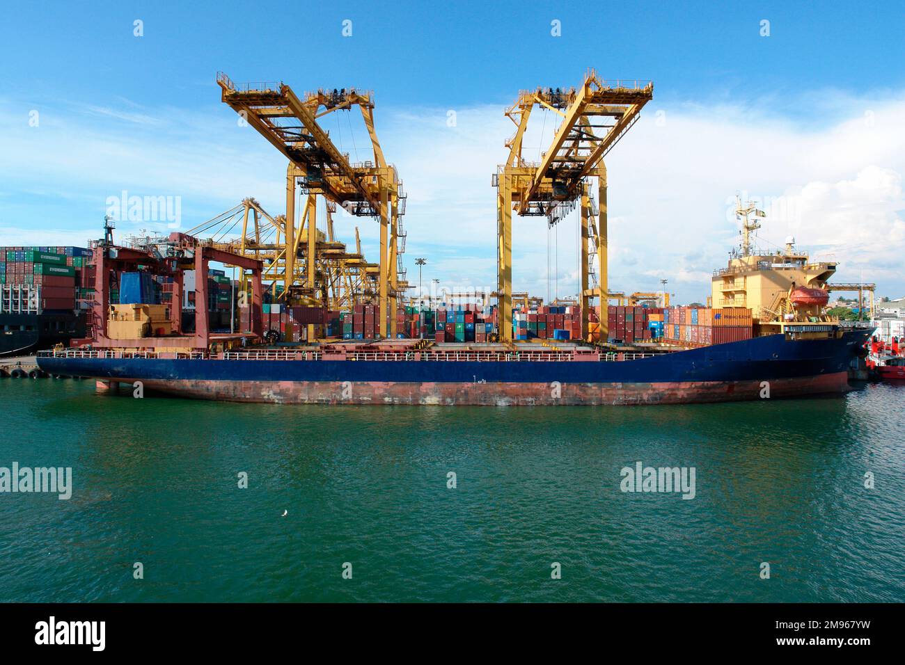Loading containers at the busy port of Colombo, Sri Lanka Stock Photo ...