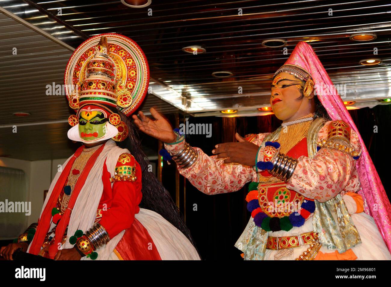 Two mask dancers in Cochin, Kerala State, India Stock Photo - Alamy