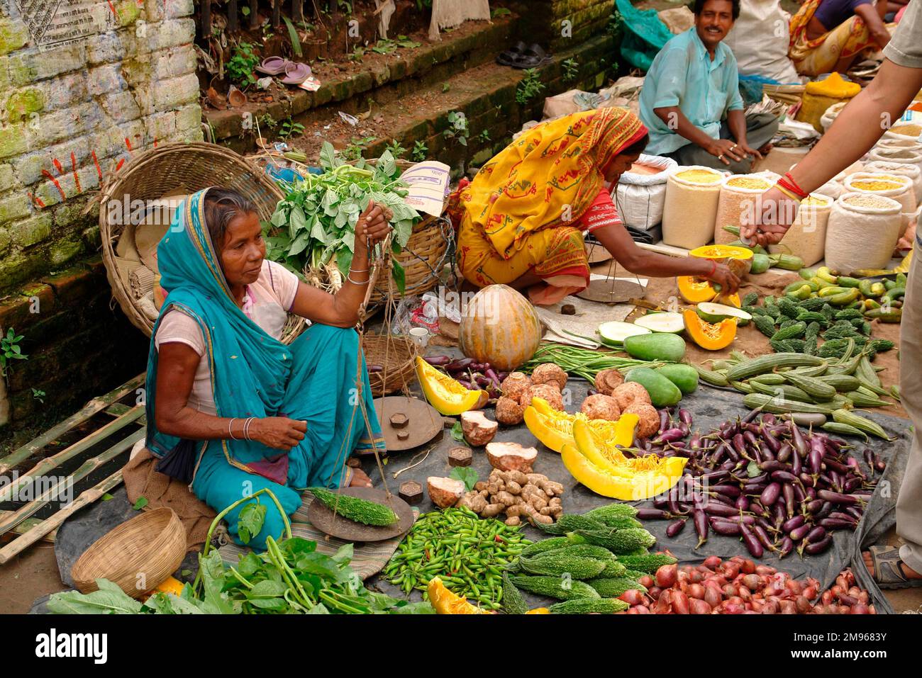 A street market selling fruit and vegetables at Matiari, a village in ...