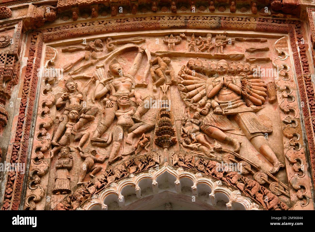 Detail of carvings above the main entrance to one of the four Shiva ...