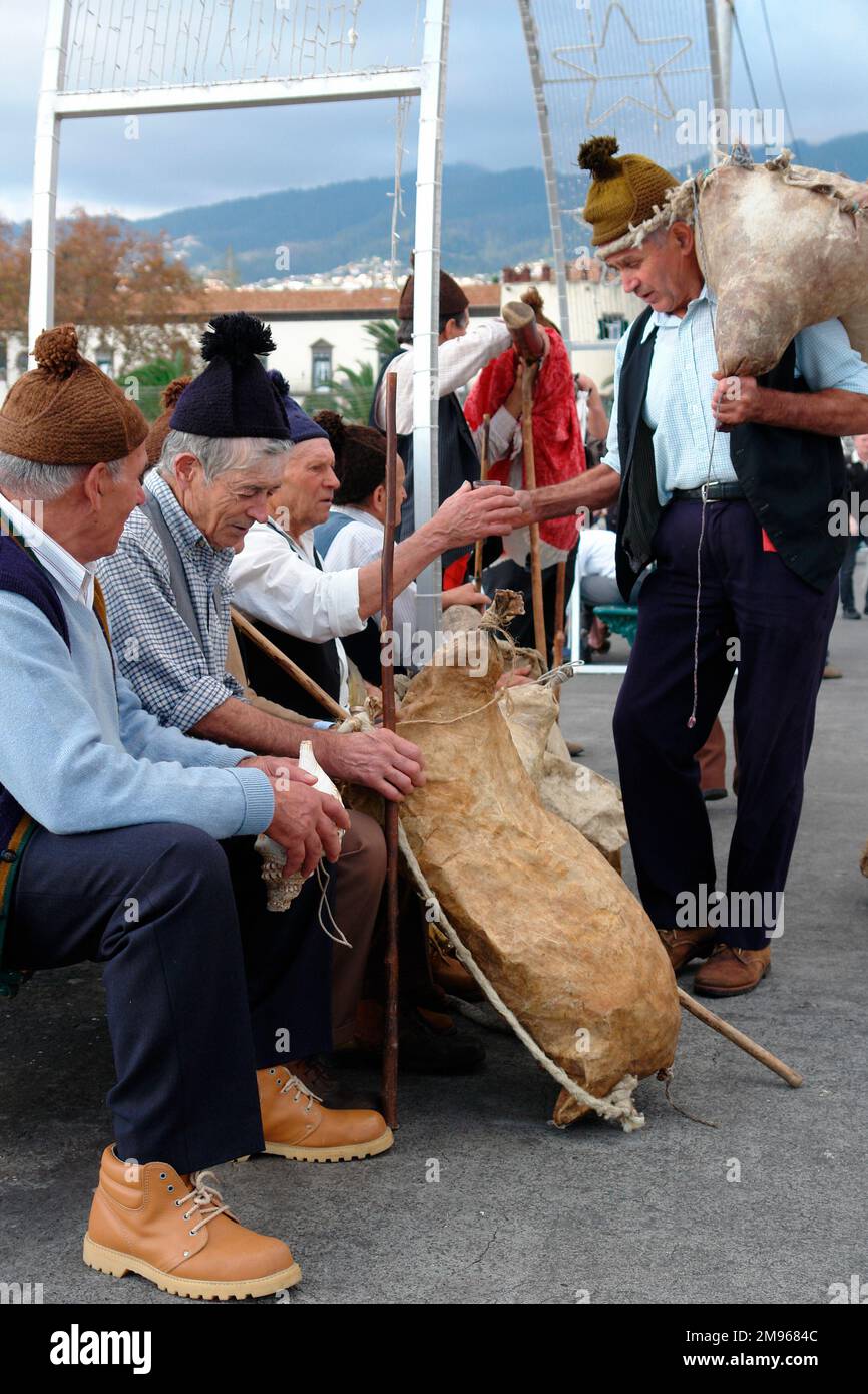 A group of men belonging to a Porto da Cruz folklore group, in Funchal ...