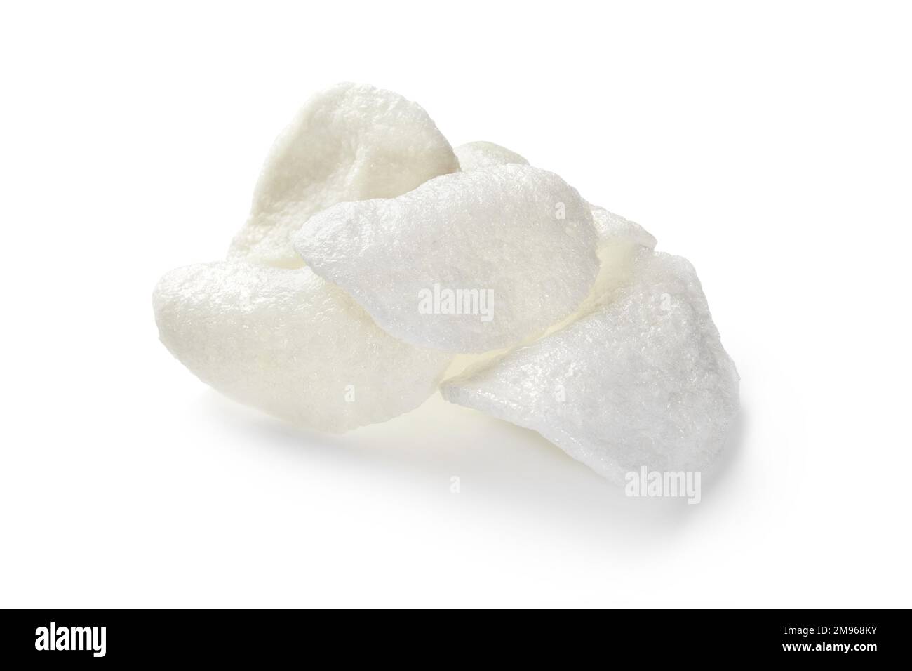Handful of crispy airy rice chips on white background Stock Photo - Alamy