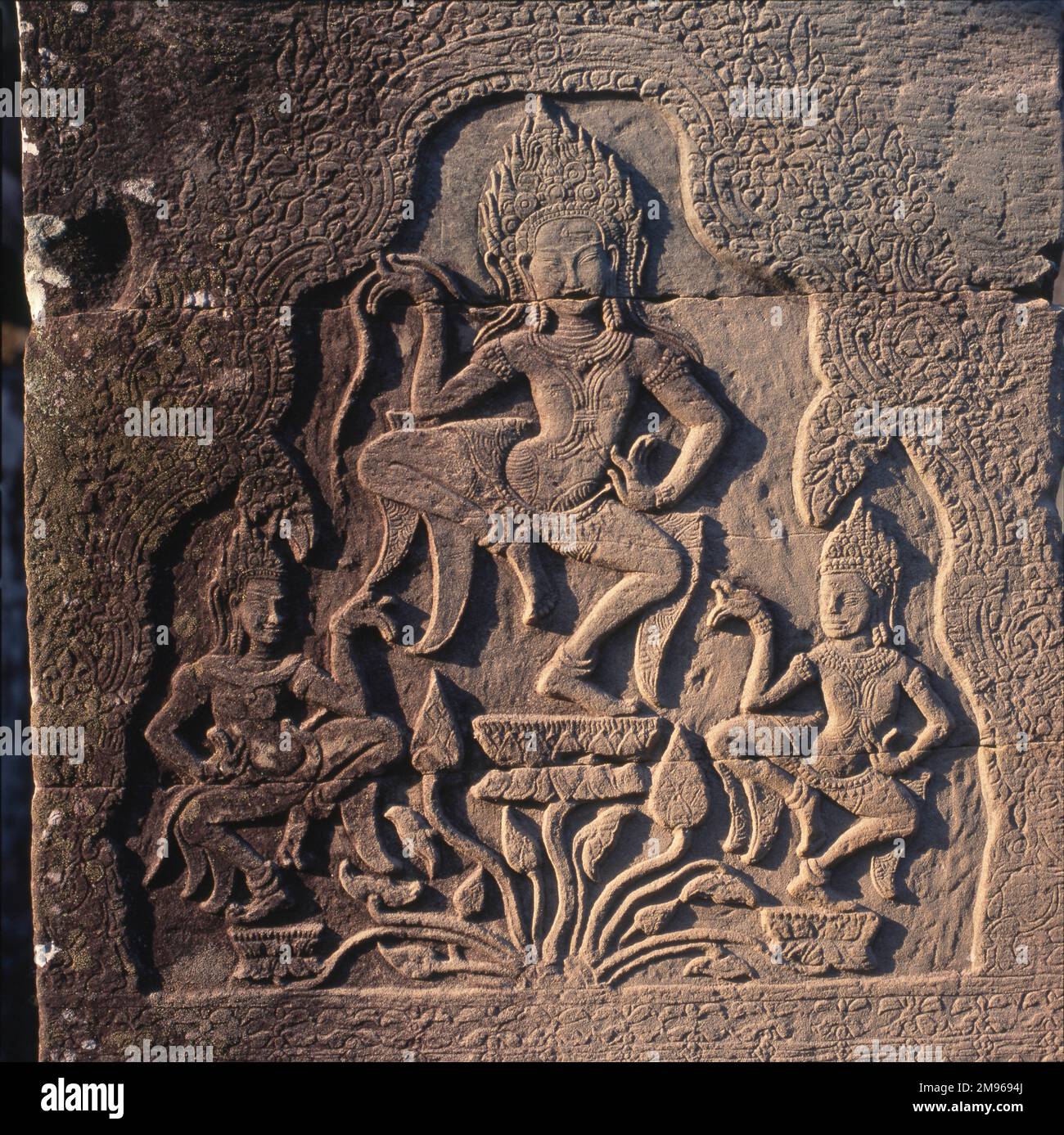 A stone relief carving at the entrance to the Wat Bayon Khmer Buddhist ...
