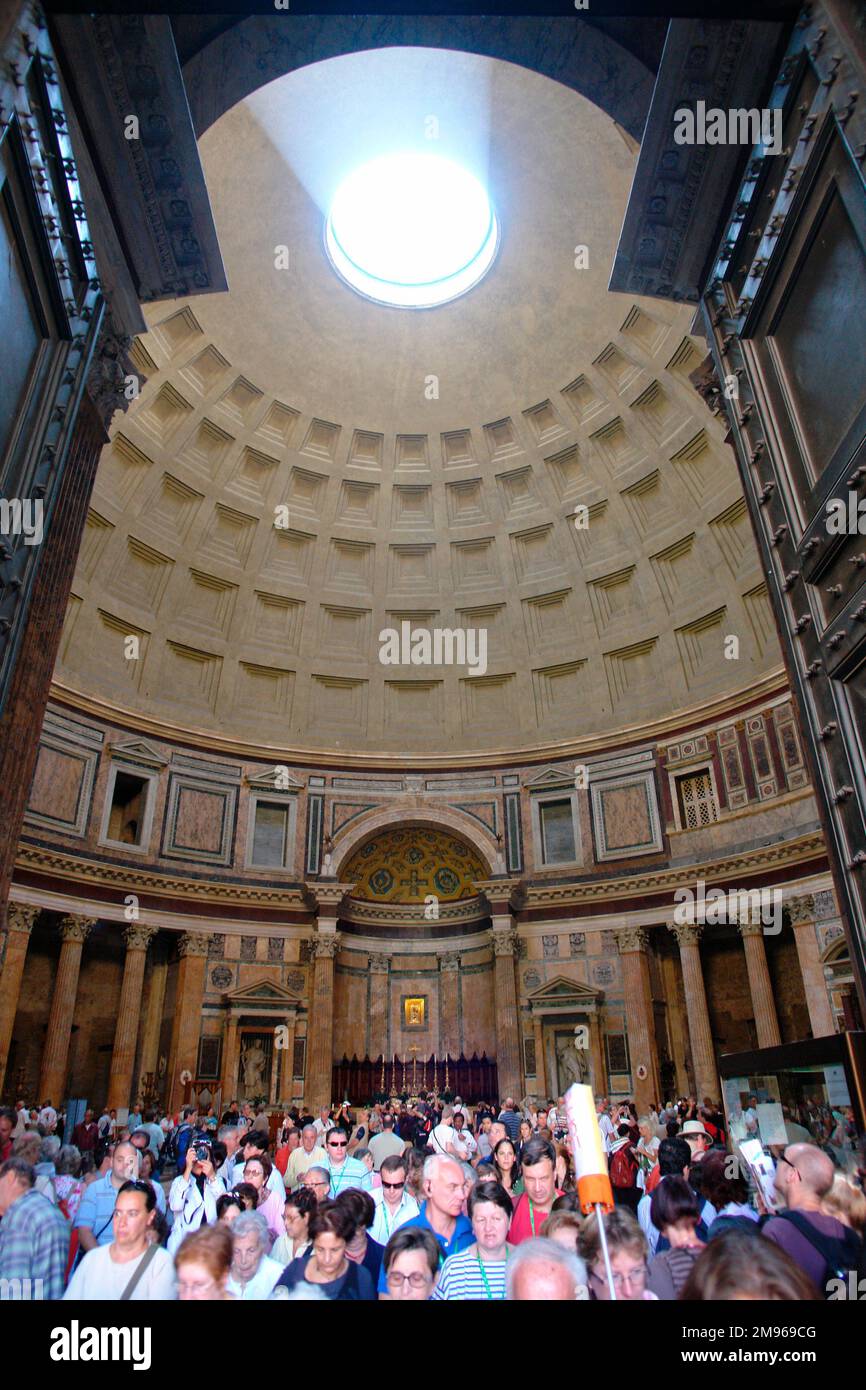 Interior of the Pantheon in Rome, Italy, with a crowd of sightseers ...