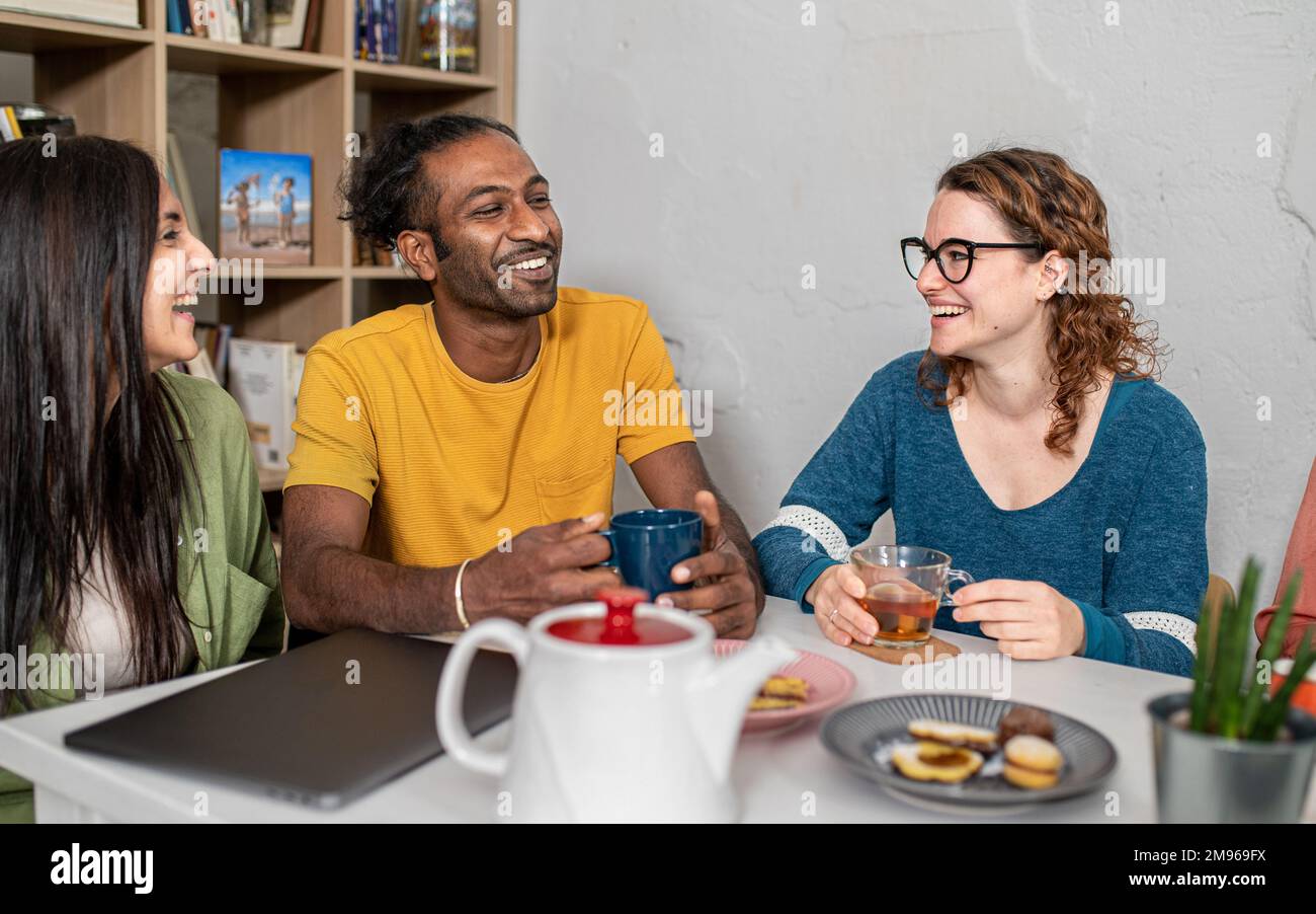 Indian friends at coffee shop hi-res stock photography and images - Alamy